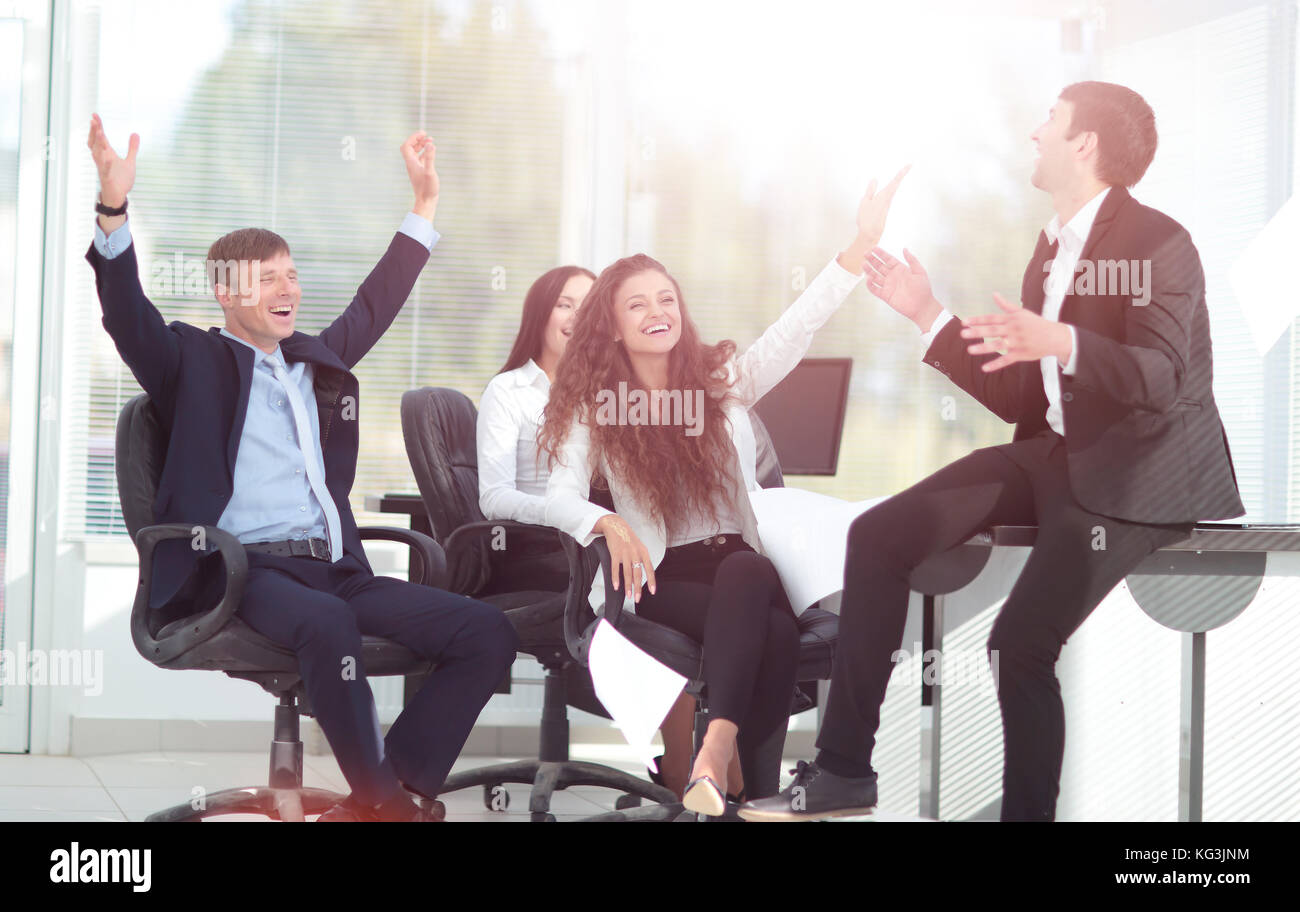 friendly business team enjoys its success in the workplace in th Stock ...