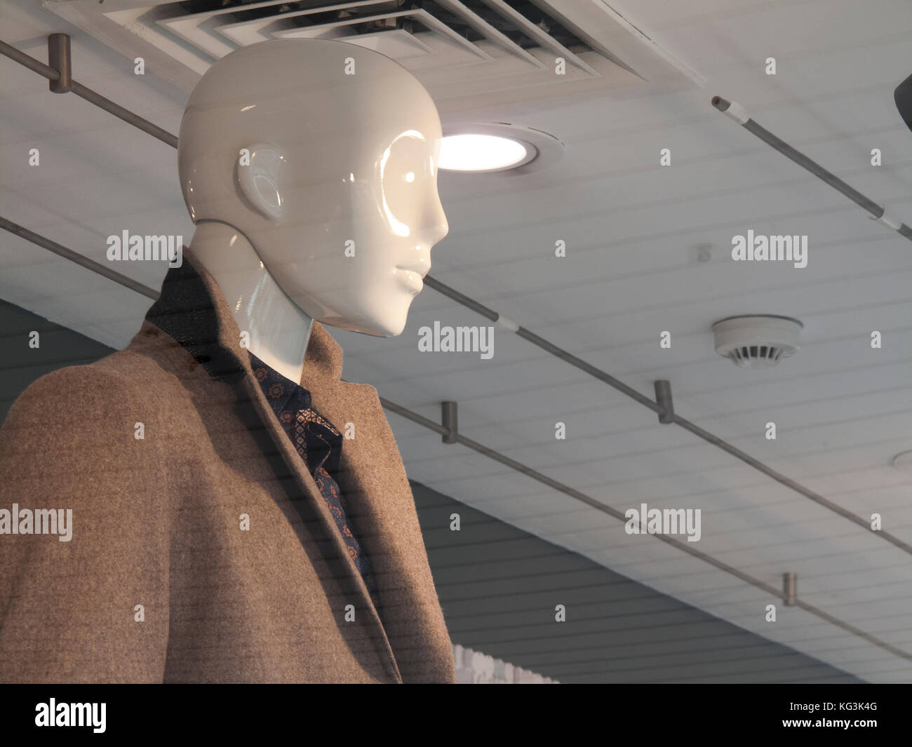 Manikin in Next shop window display, women and men high street fashion ...