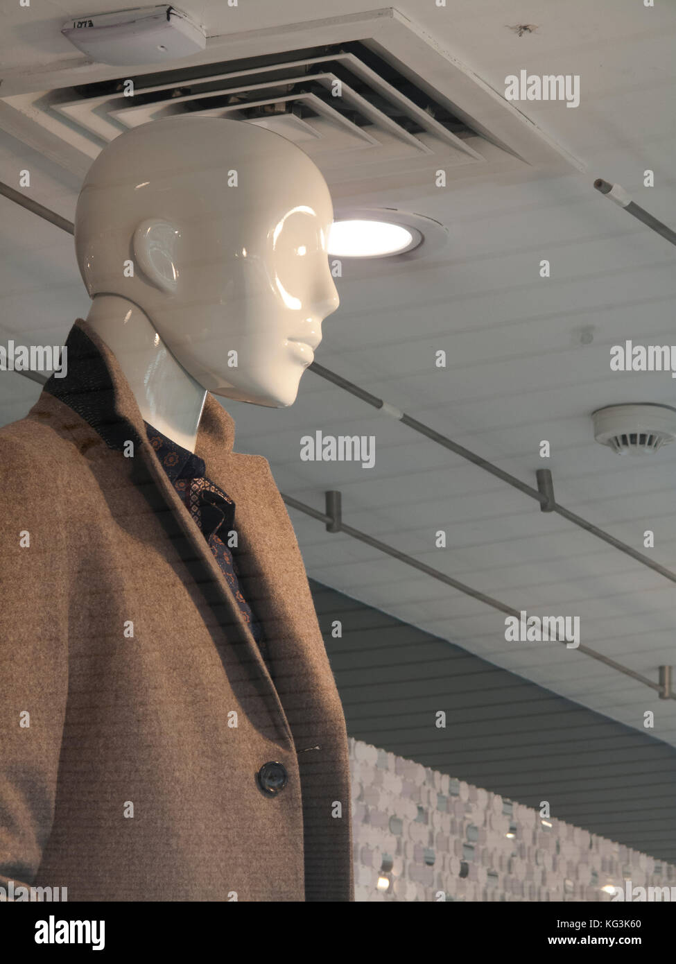 Manikin in Next shop window display, women and men high street fashion ...