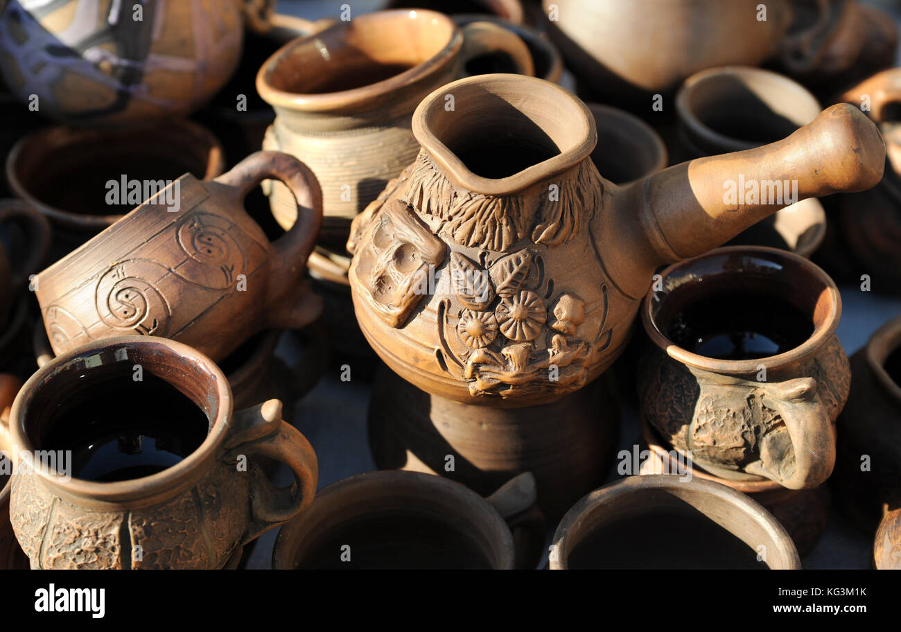 Ceramic ware. Clay cezve decorated with a molding Stock Photo - Alamy
