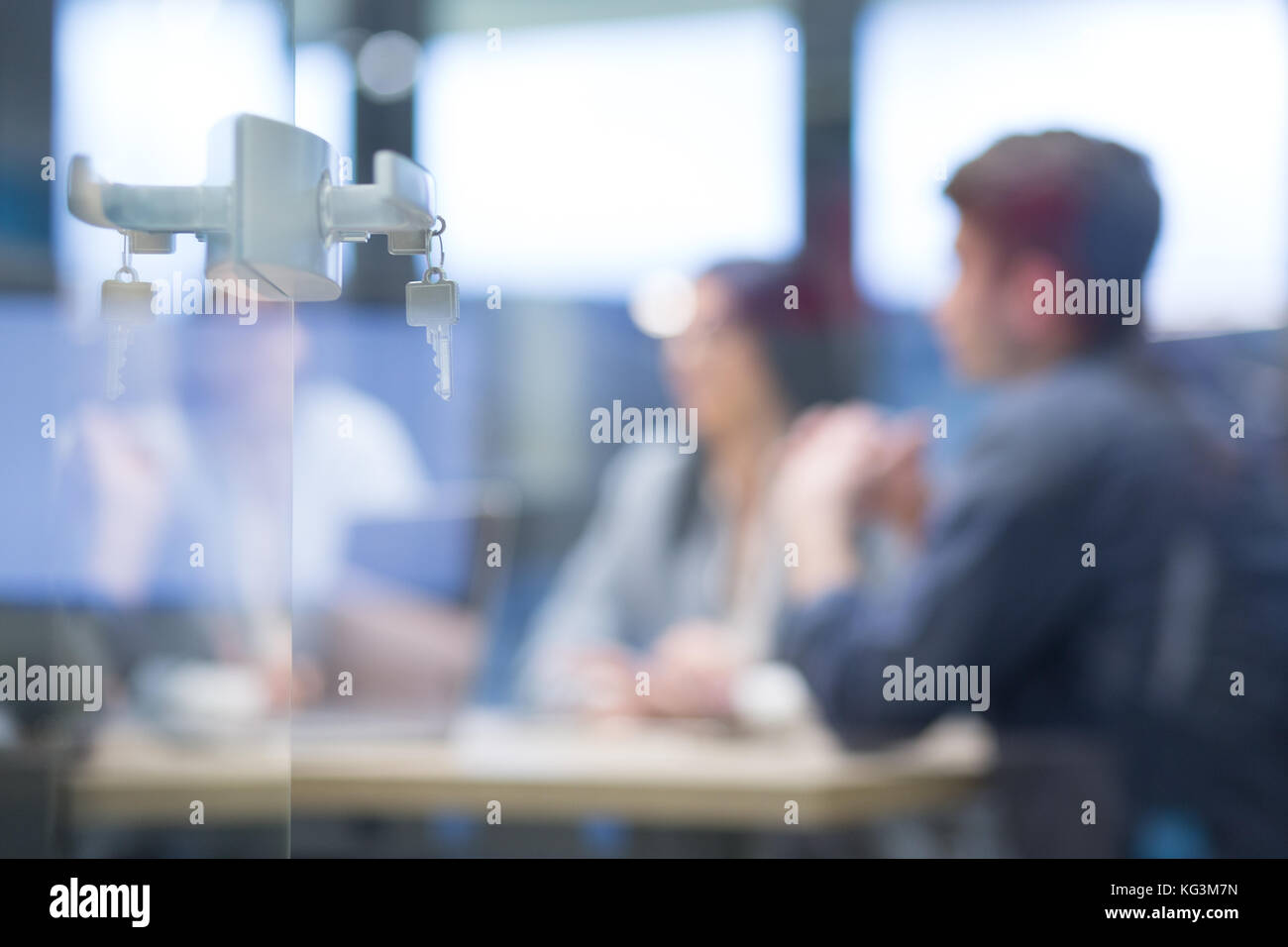 Open glass door with keys, key in keyhole Stock Photo - Alamy