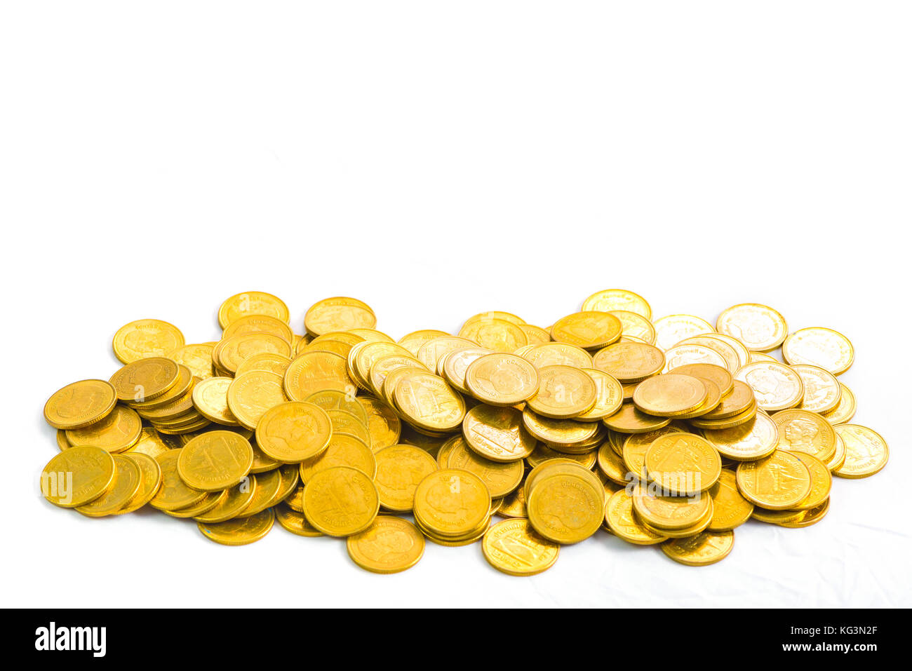 Columns of gold coins, piles of coins arranged on white background ...