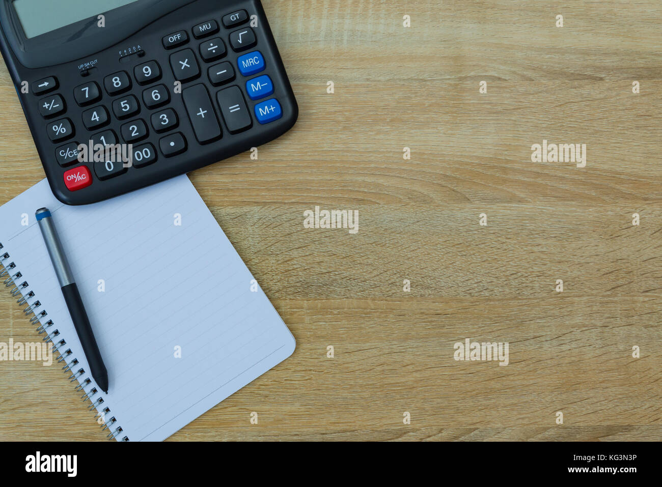 calculator note on working table or desk, work space with copy space ...