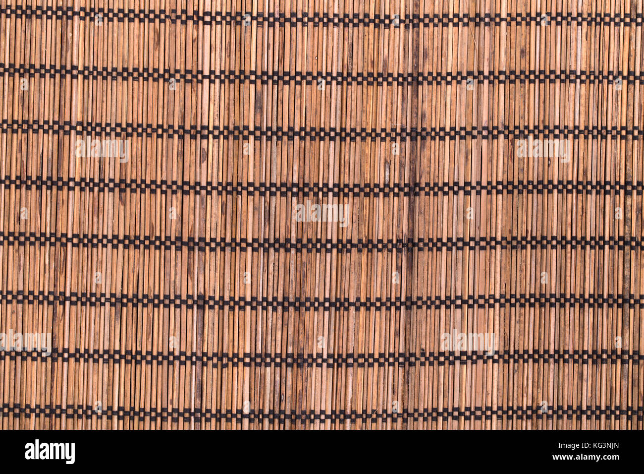 Background from thin straws with horizontal dark strips. The straws are ...