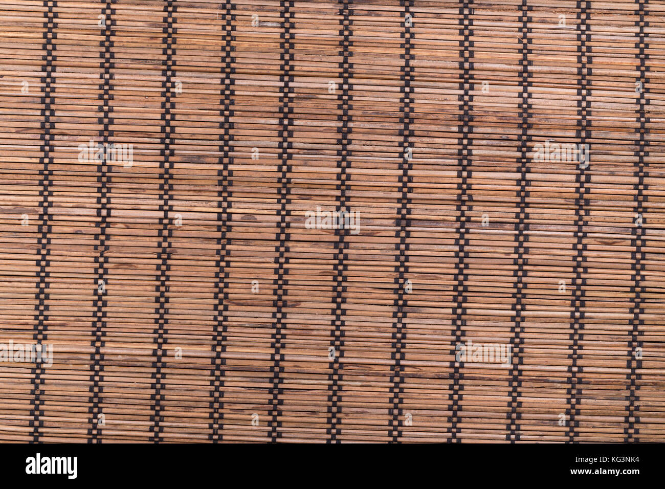 Background from thin straws with vertical dark strips. The straws are ...