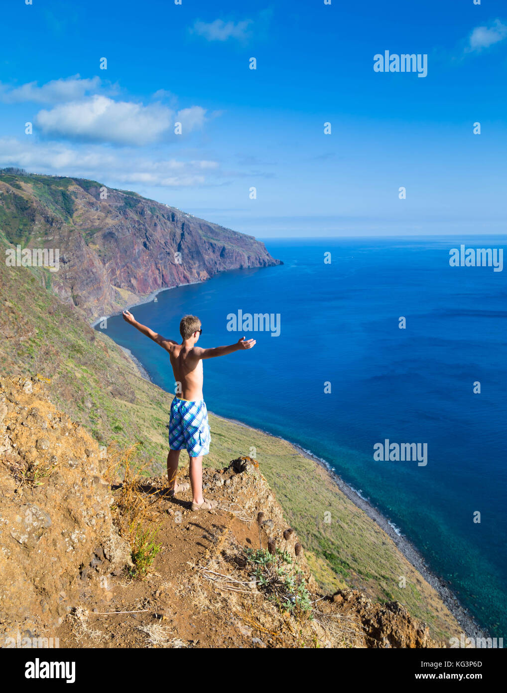 the single person stretched hands on sea break Stock Photo - Alamy