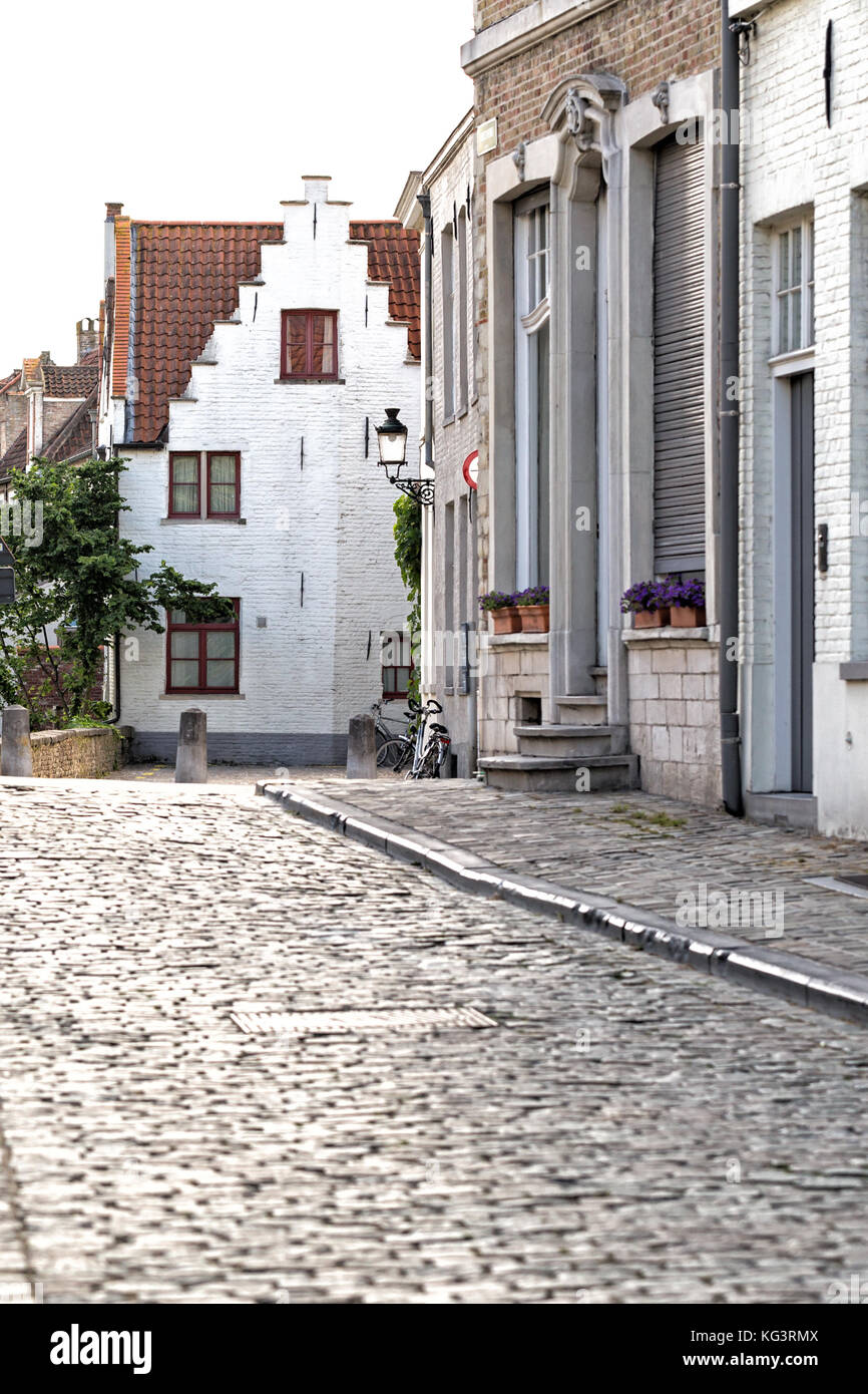 The street in Bruges, Belgium. Ancient stone blocks and traditional ...
