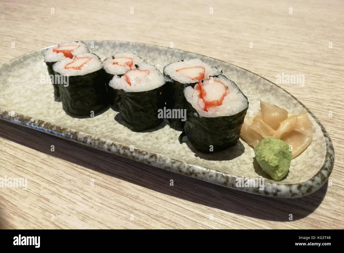 Ebiko maki sushi rolls Japanese food style in a ceramic plate Stock ...