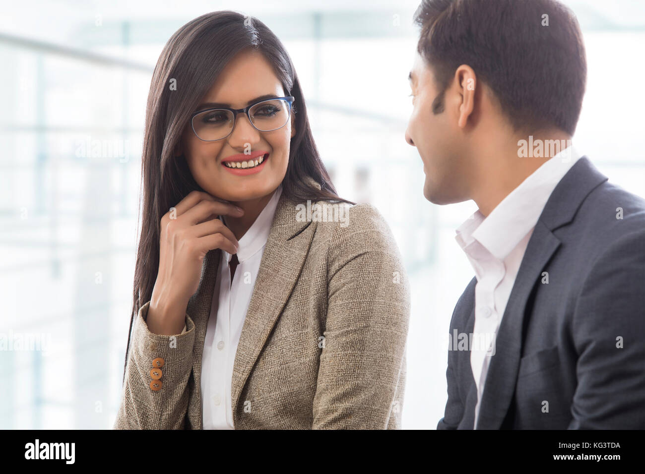 Portrait businessman sitting businesswoman hi-res stock photography and ...