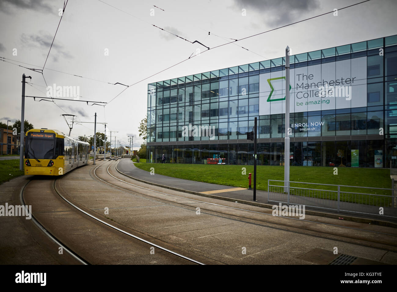 A yellow Metrolink Manchester tram at Hollyhedge Road, Benchill ...