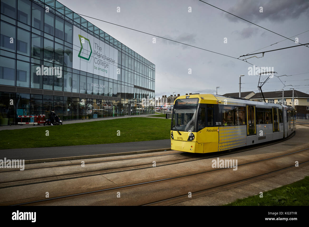 A yellow Metrolink Manchester tram at Hollyhedge Road, Benchill ...