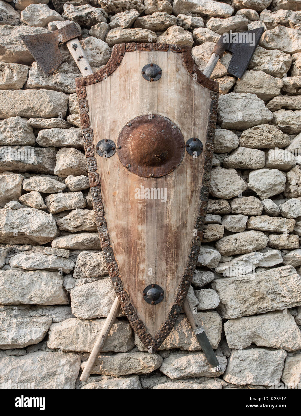 Medieval shield and axes. Ancient weapon Stock Photo - Alamy