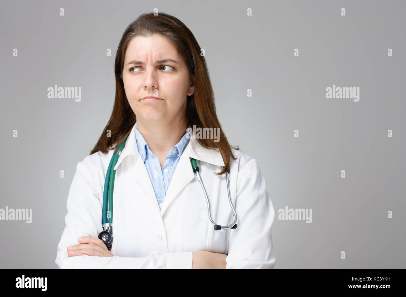 Portrait of an angry, annoyed female doctor Stock Photo - Alamy