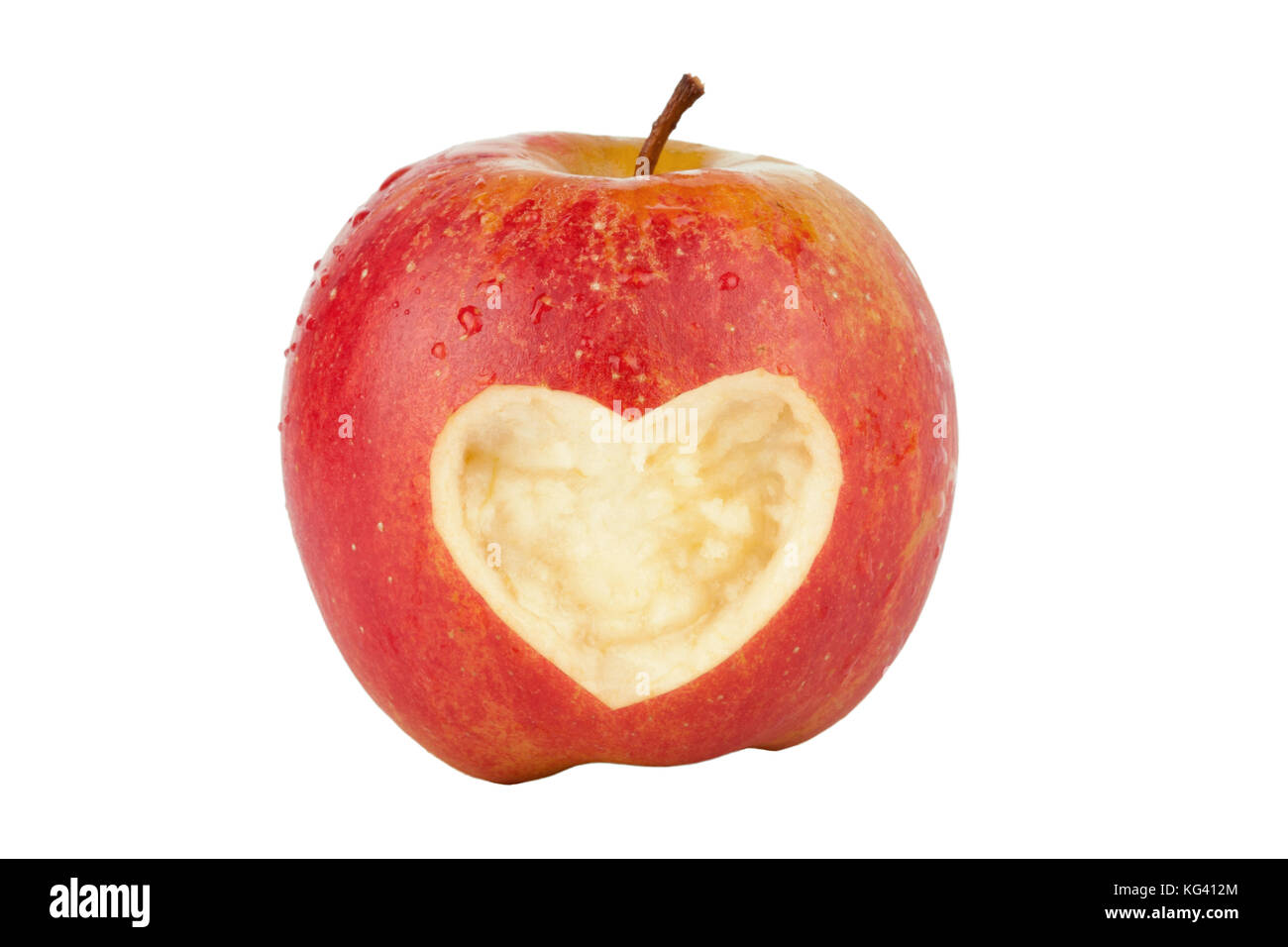 Apple with a heart symbol isolated on white Stock Photo - Alamy