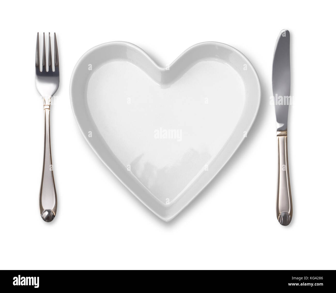 Kitchenware on table in Cut Out Stock Images & Pictures - Alamy