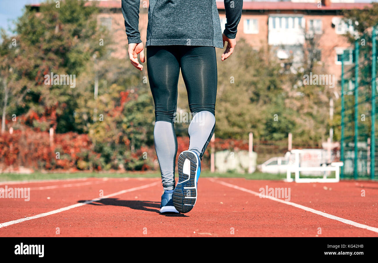athlete running in the stadium Stock Photo - Alamy