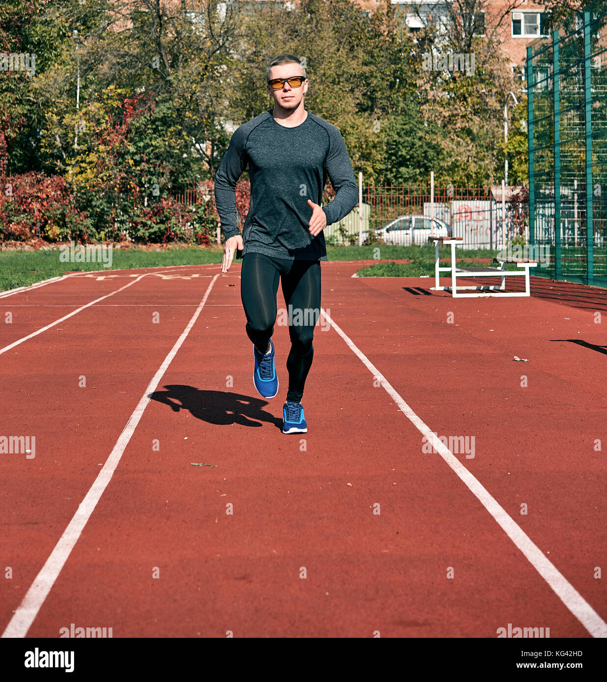athlete running in the stadium Stock Photo - Alamy