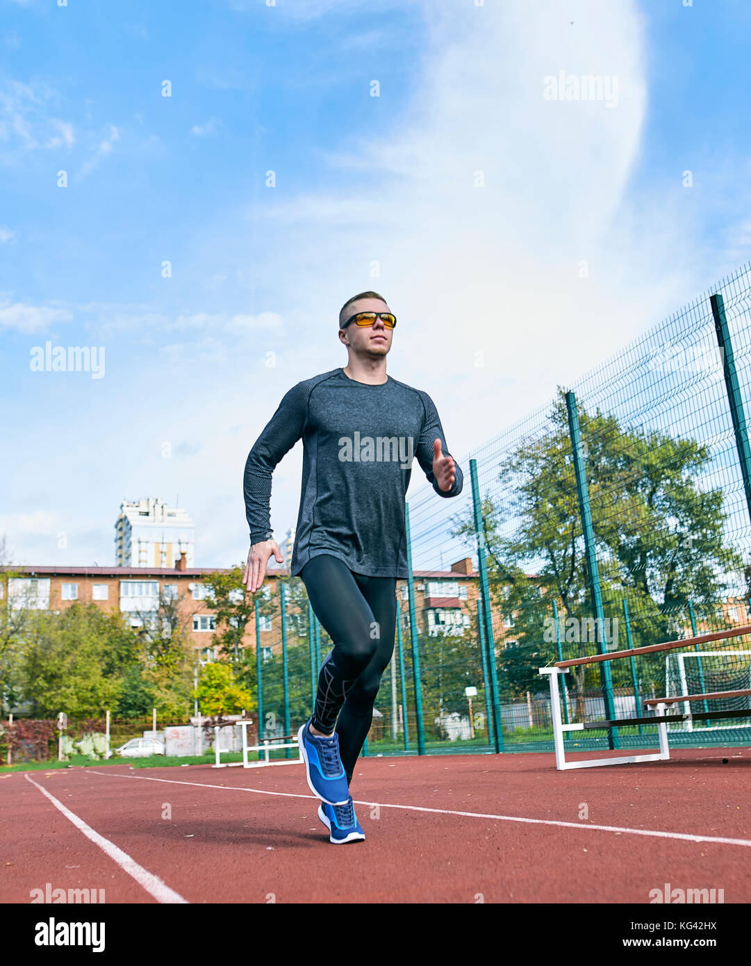 athlete running in the stadium Stock Photo - Alamy