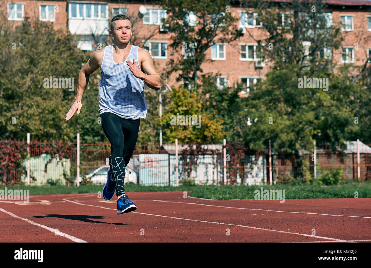 athlete running in the stadium Stock Photo - Alamy