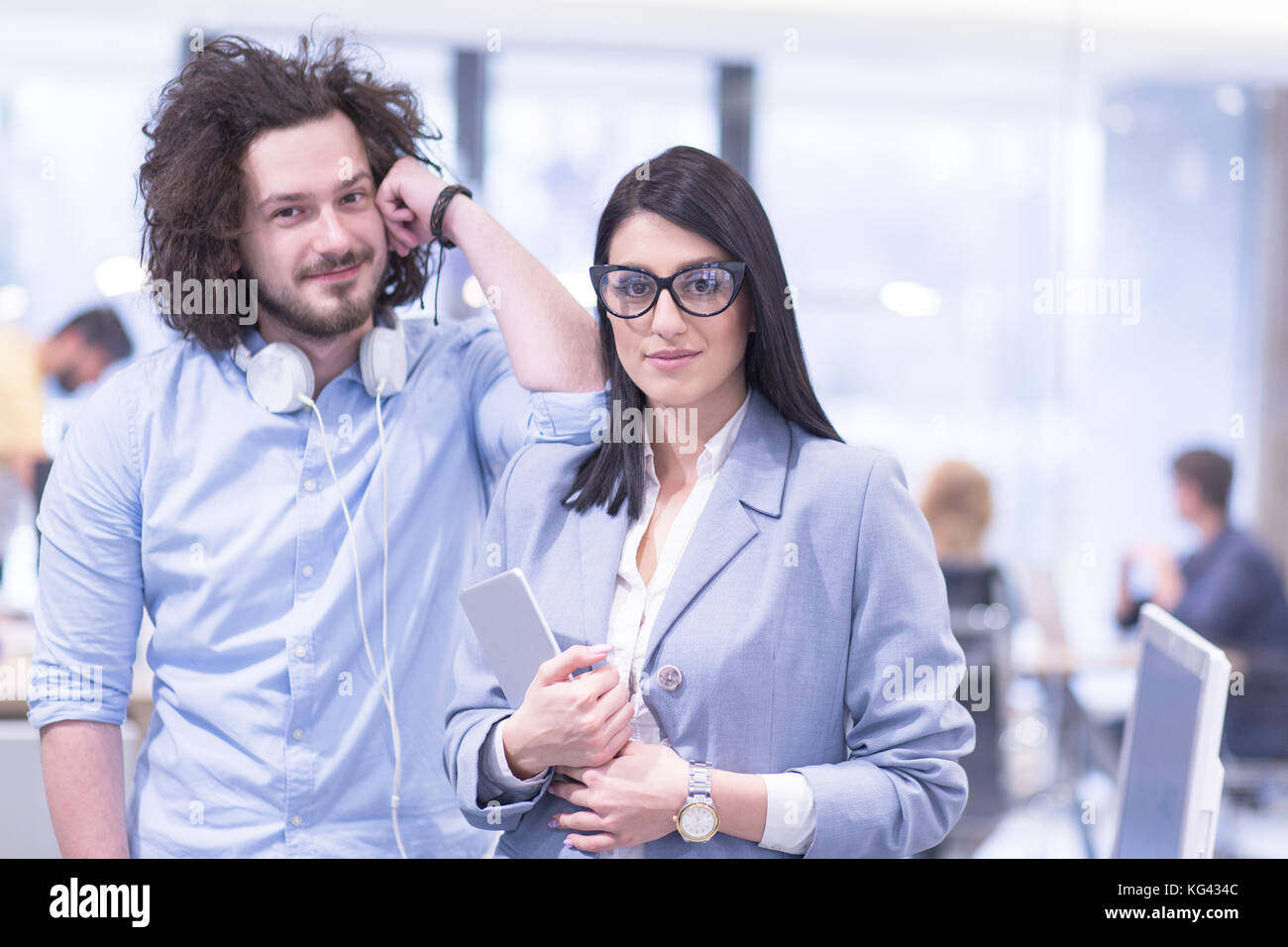 business people using tablet computer while preparing for next meeting ...