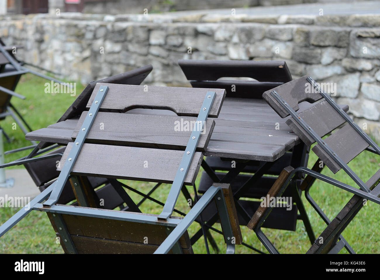 Empty table and chairs lean on table Stock Photo - Alamy