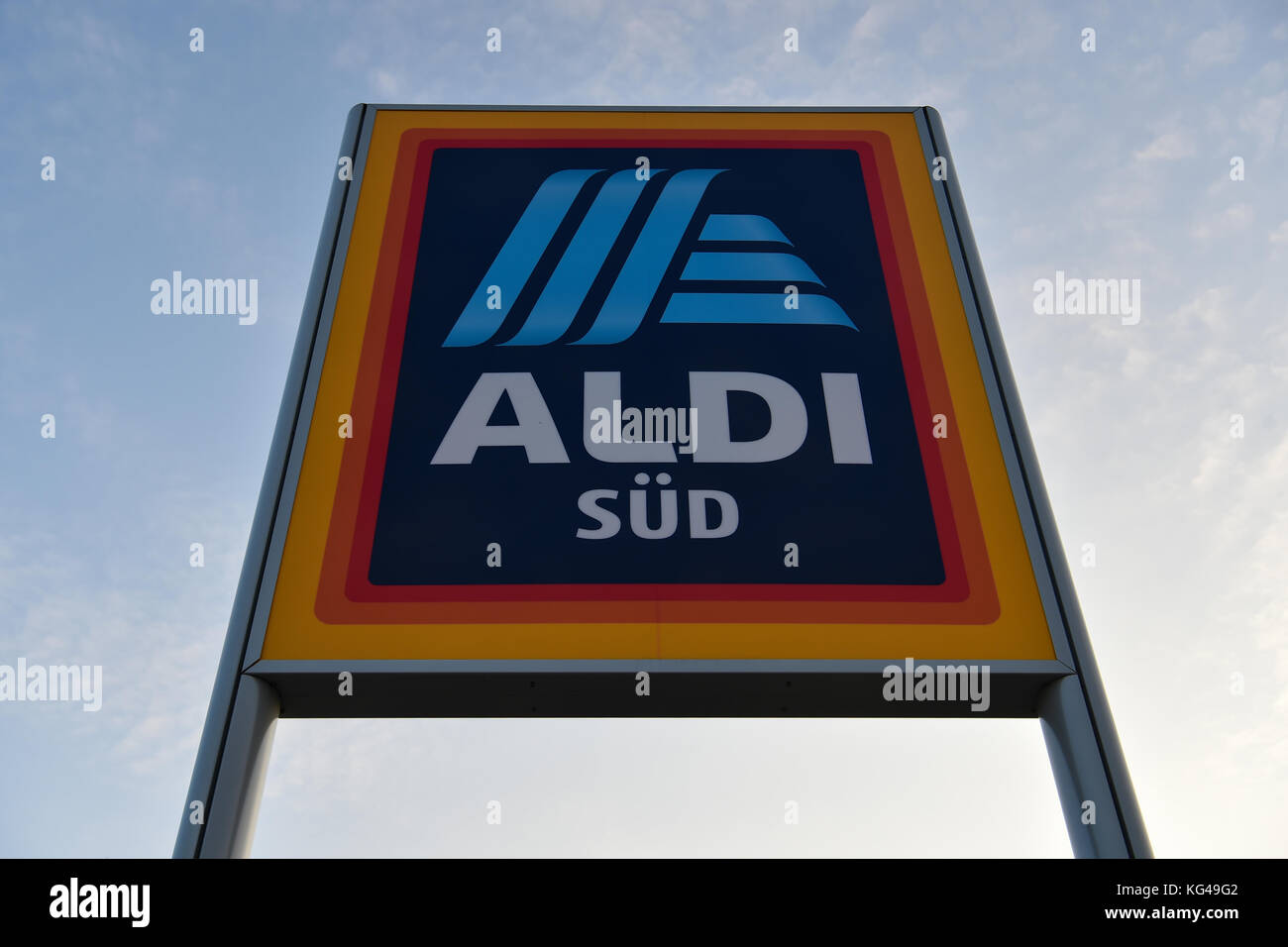 A sign with the new logo of the discount store Aldi placed in front of ...