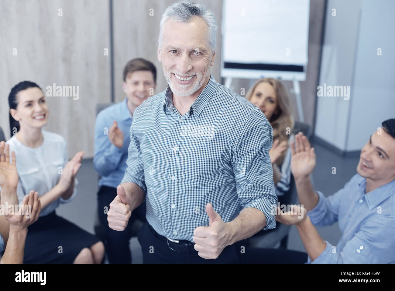Enigmatical mature man being very glad Stock Photo - Alamy