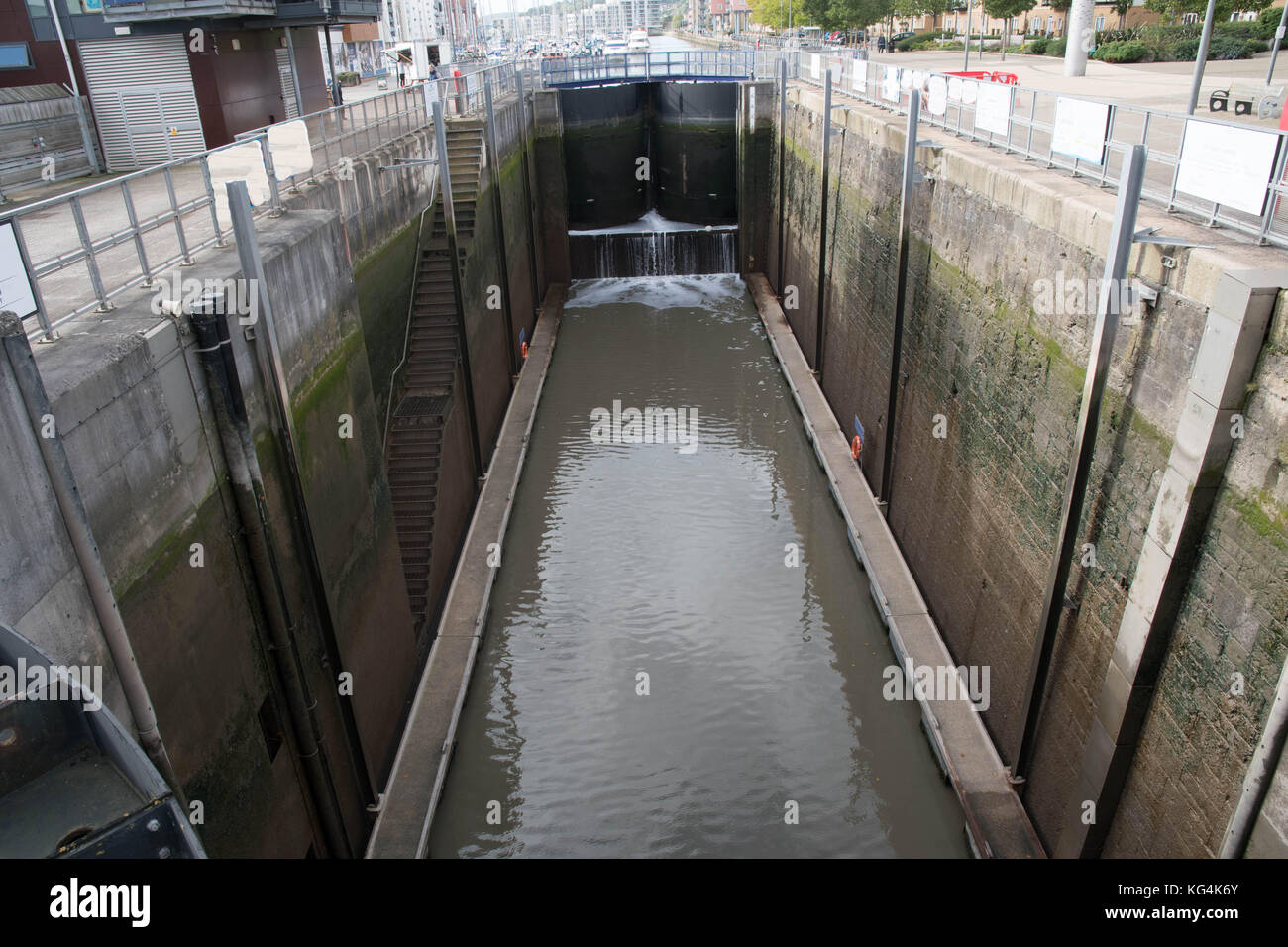 Marina lock prepares for boats intake Stock Photo - Alamy