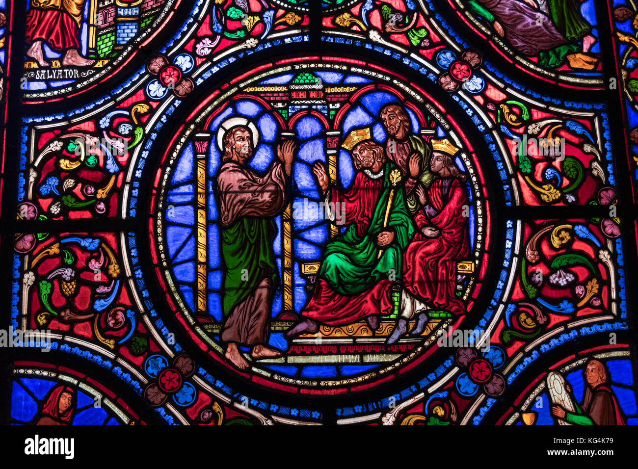 a stained glass church window depicts saints Stock Photo - Alamy