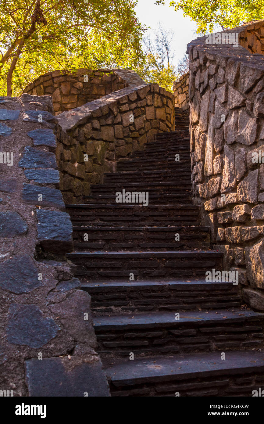 Stone stairs leading upward in the Stone Mountain Park in sunny autumn ...
