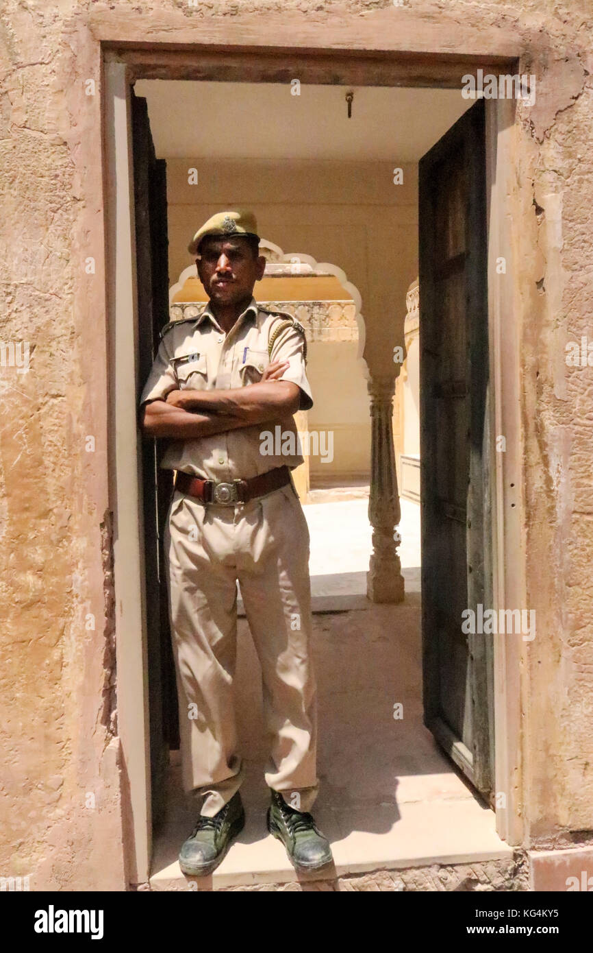 Indian man security guard portrait hi-res stock photography and images ...