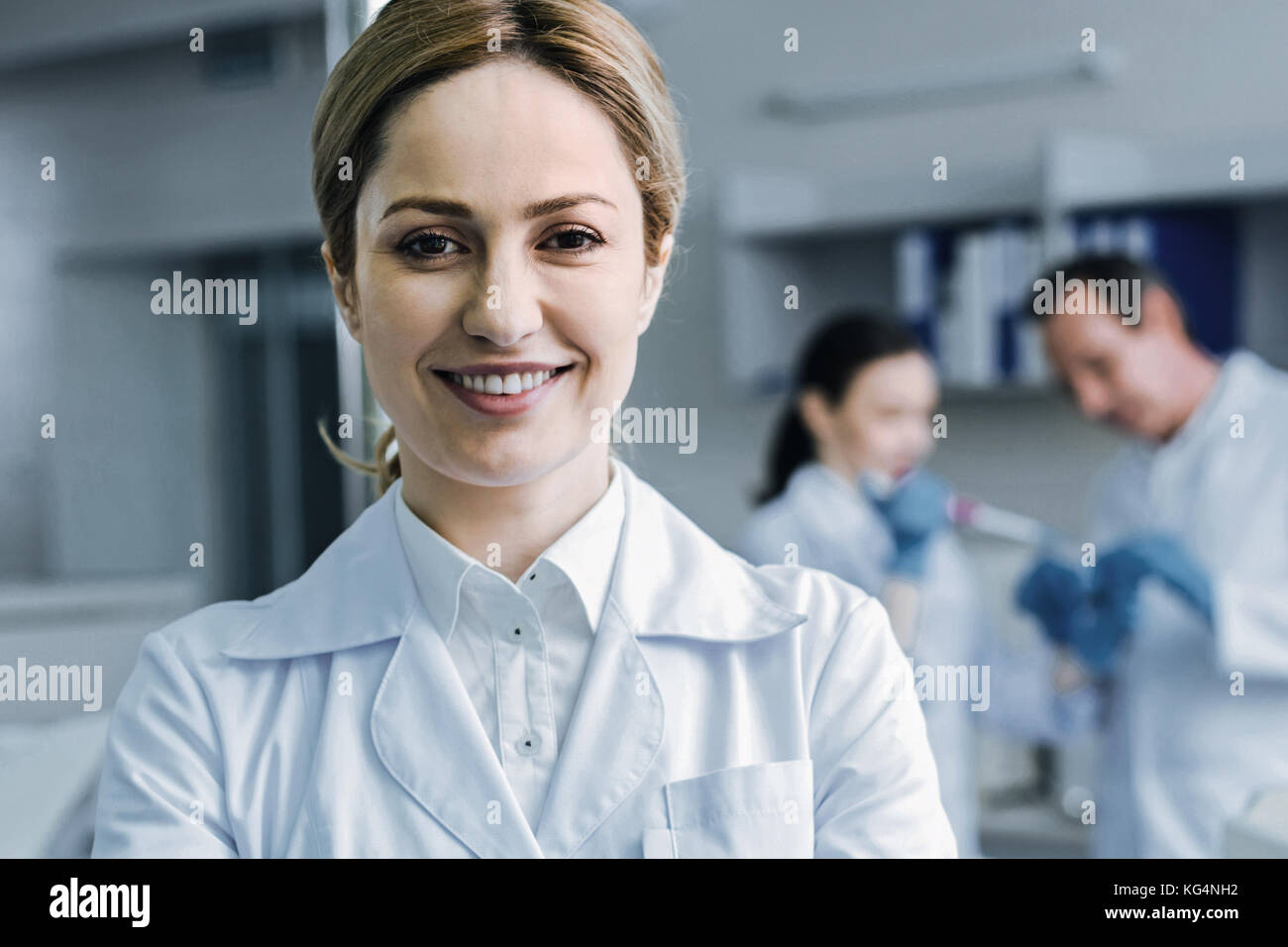 Portrait of a cheerful beautiful researcher Stock Photo - Alamy