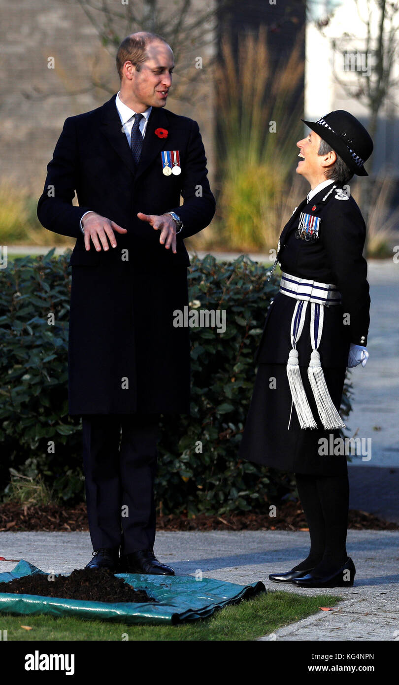 The Duke of Cambridge plants a tree in the memorial garden as ...