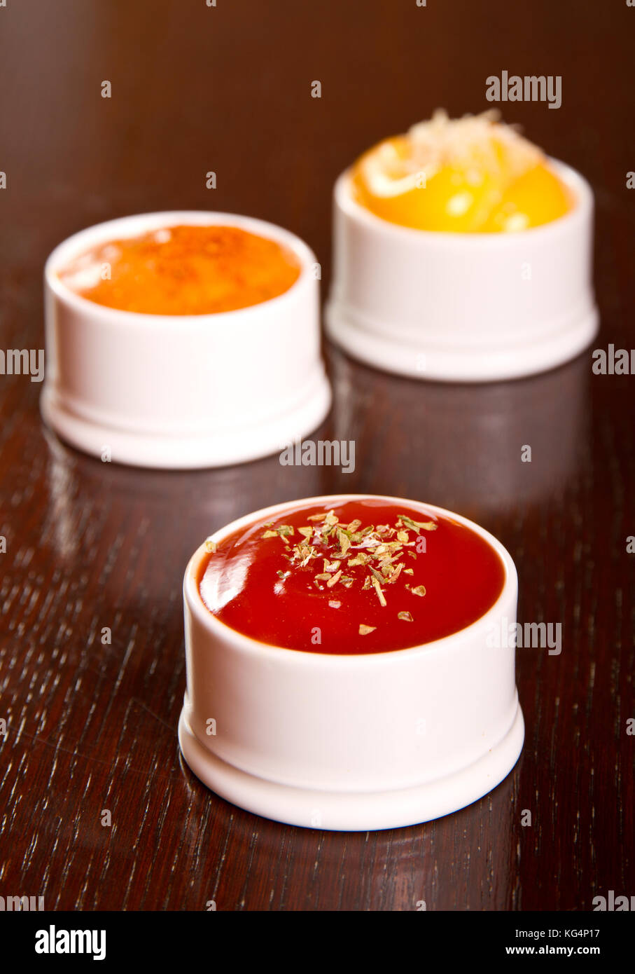 Three kinds of dips on a table Stock Photo - Alamy