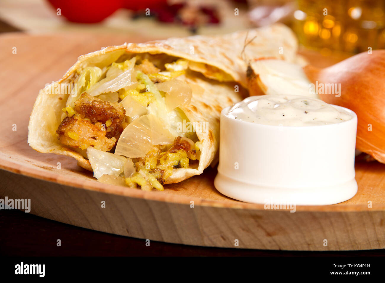 Traditional tortilla on a wooden plate Stock Photo - Alamy