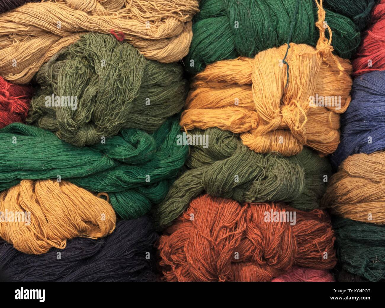 Colorful stacks of wool for fabrics and cloths in Iran Stock Photo - Alamy