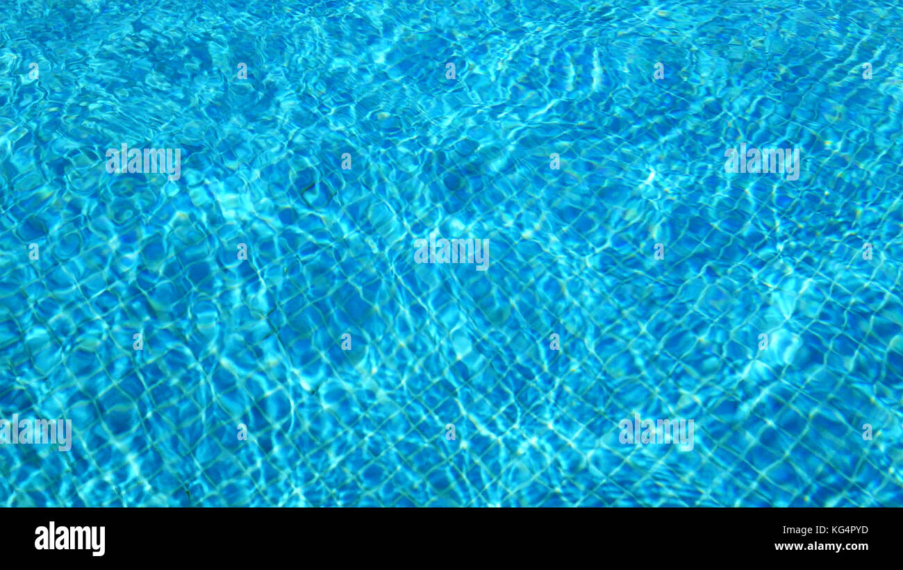 Blue water in swimming pool Stock Photo - Alamy