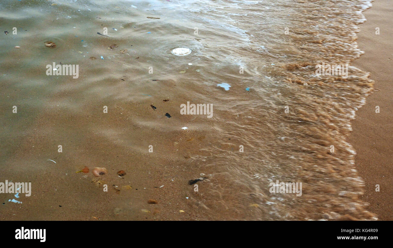 Dirty polluted water at the seashore Stock Photo - Alamy