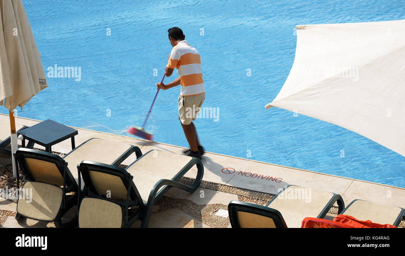 Worker maintenance swimming pool hi-res stock photography and images ...
