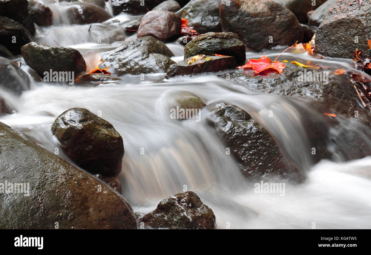 Water cascading through rocks hi-res stock photography and images - Alamy