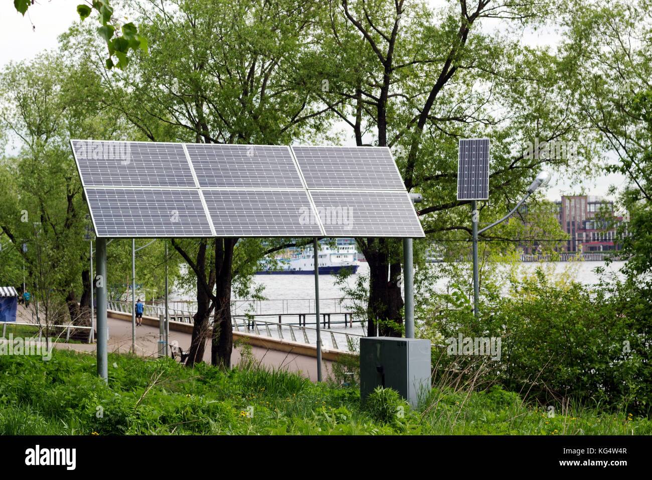 Solar array in the park for track lighting Stock Photo - Alamy