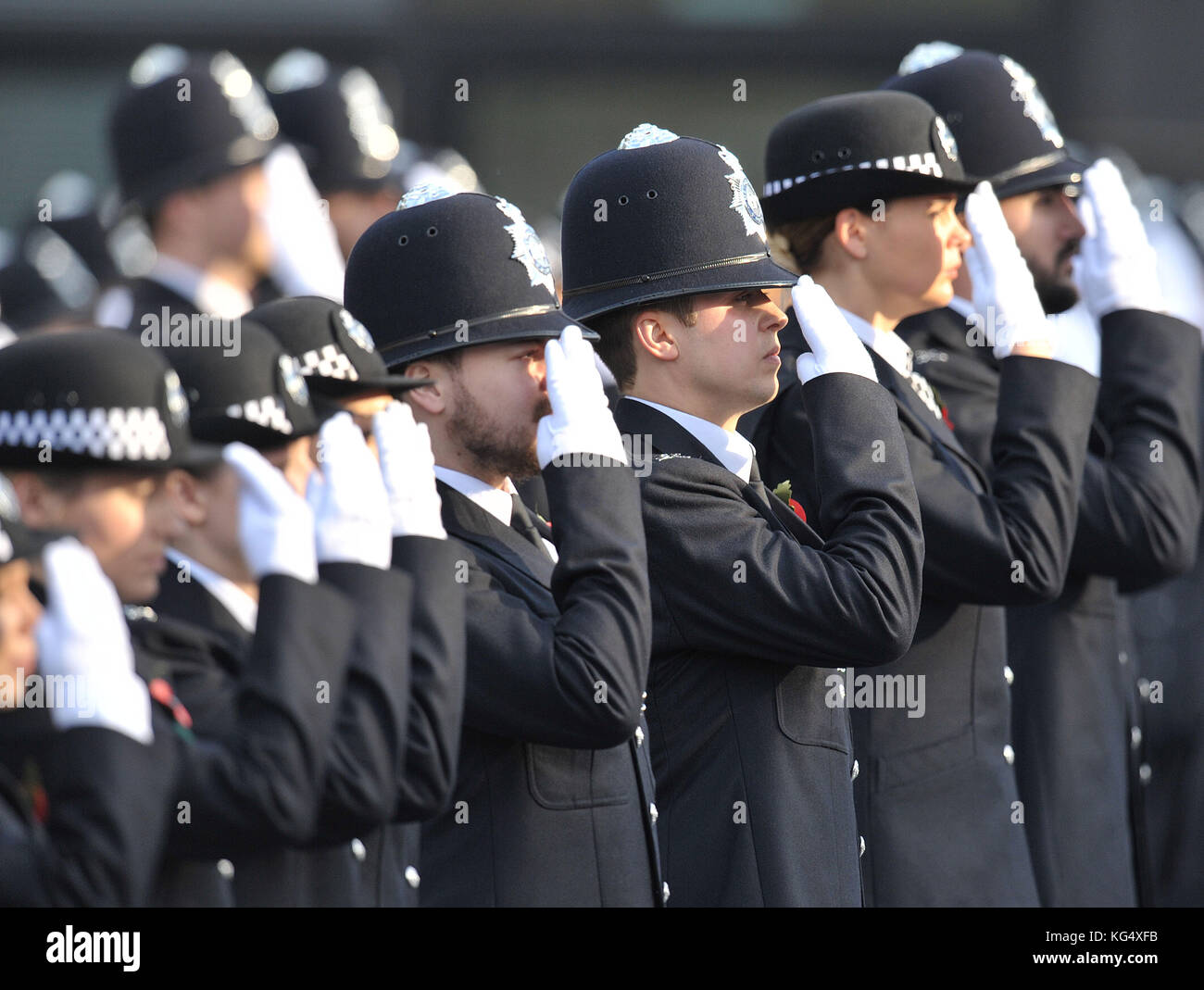 Police officers saluting hi-res stock photography and images - Alamy