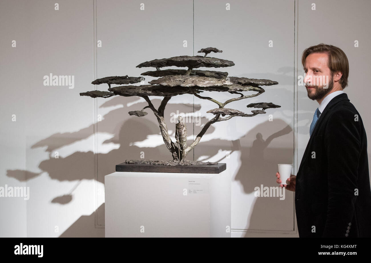 A visitor views 'Acacia Tree' by Domenica de Ferranti, part of the ...