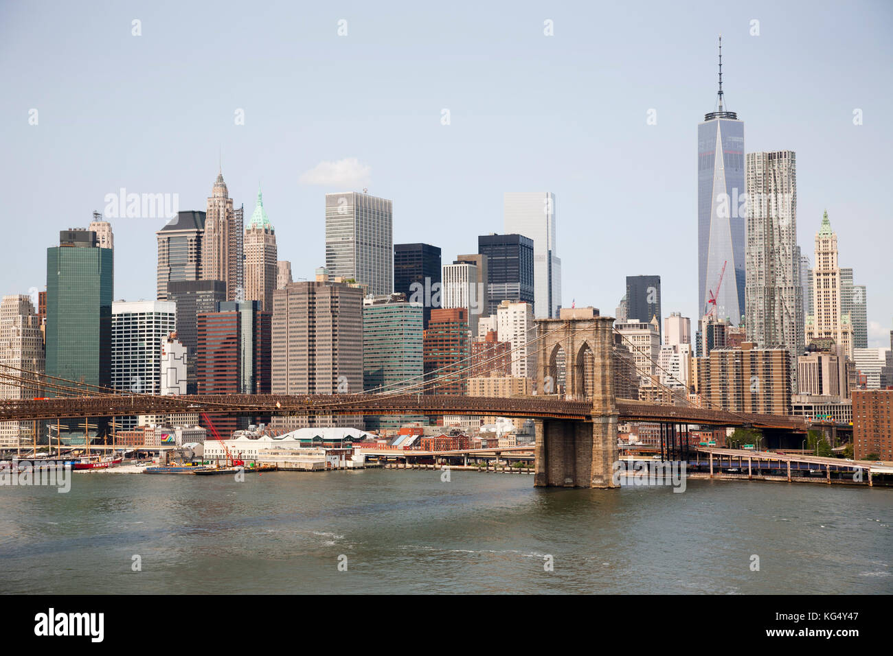 cityscape with Brooklyn bridge and East river, Manhattan, New York, USA ...
