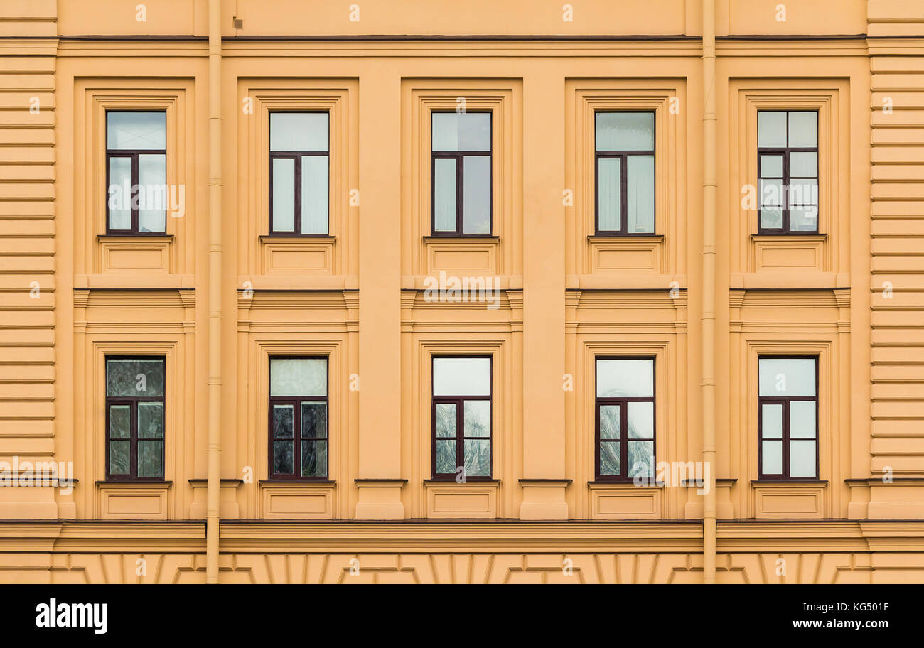 Many windows in a row on facade of urban office building front view, St ...
