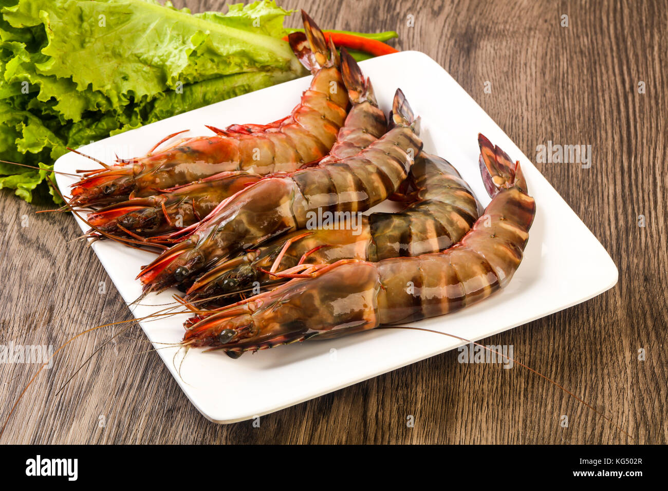Raw big tiger prawn - ready for cooking Stock Photo - Alamy