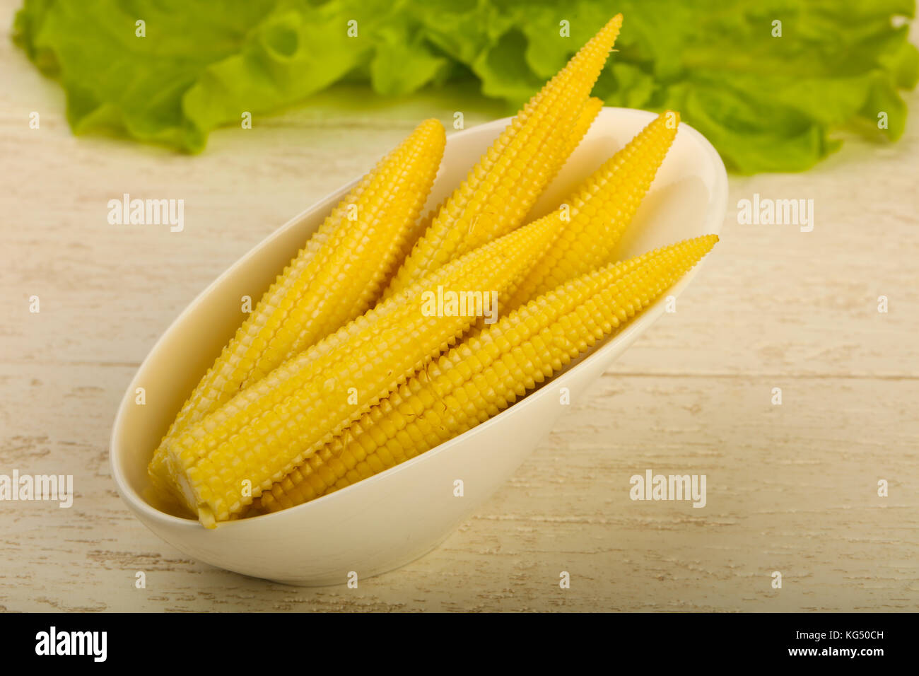 Young raw baby corn Stock Photo - Alamy