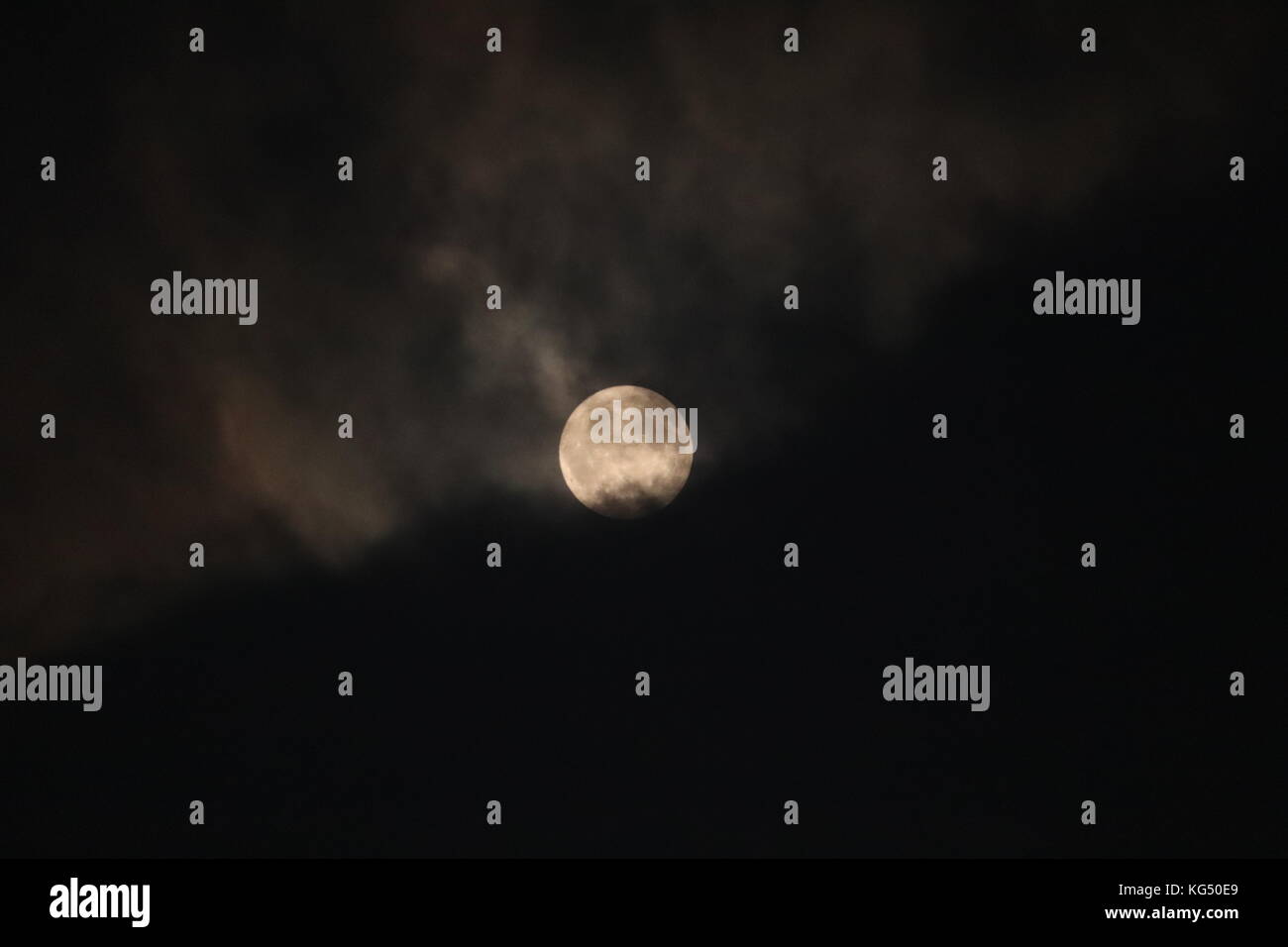 Full moon hidden by clouds hi-res stock photography and images - Alamy