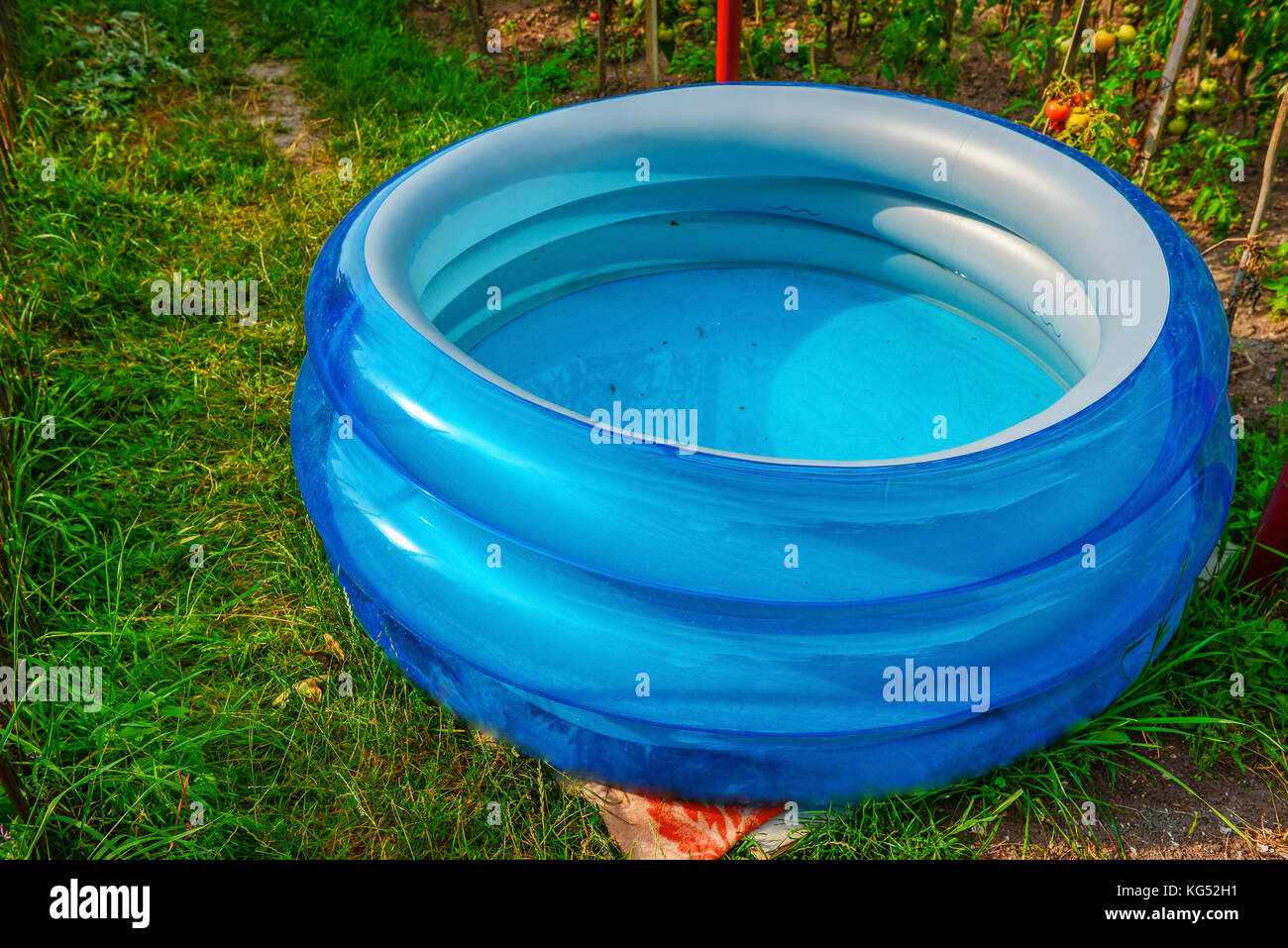 Plastic pool in a summer day outdoors Stock Photo - Alamy