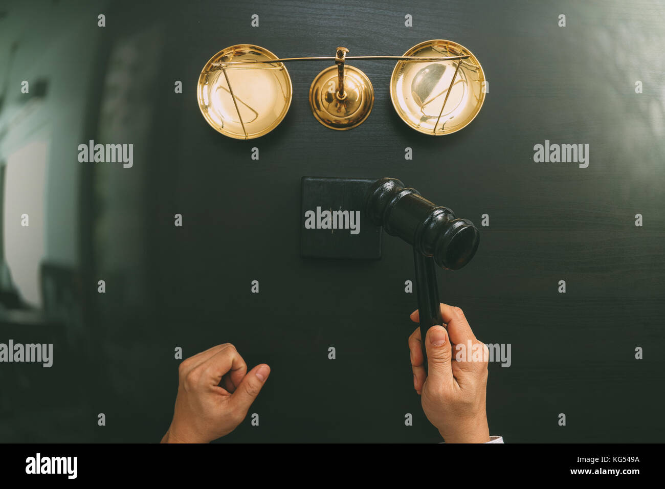 justice and law concept.Top view of Male judge hand in a courtroom with ...